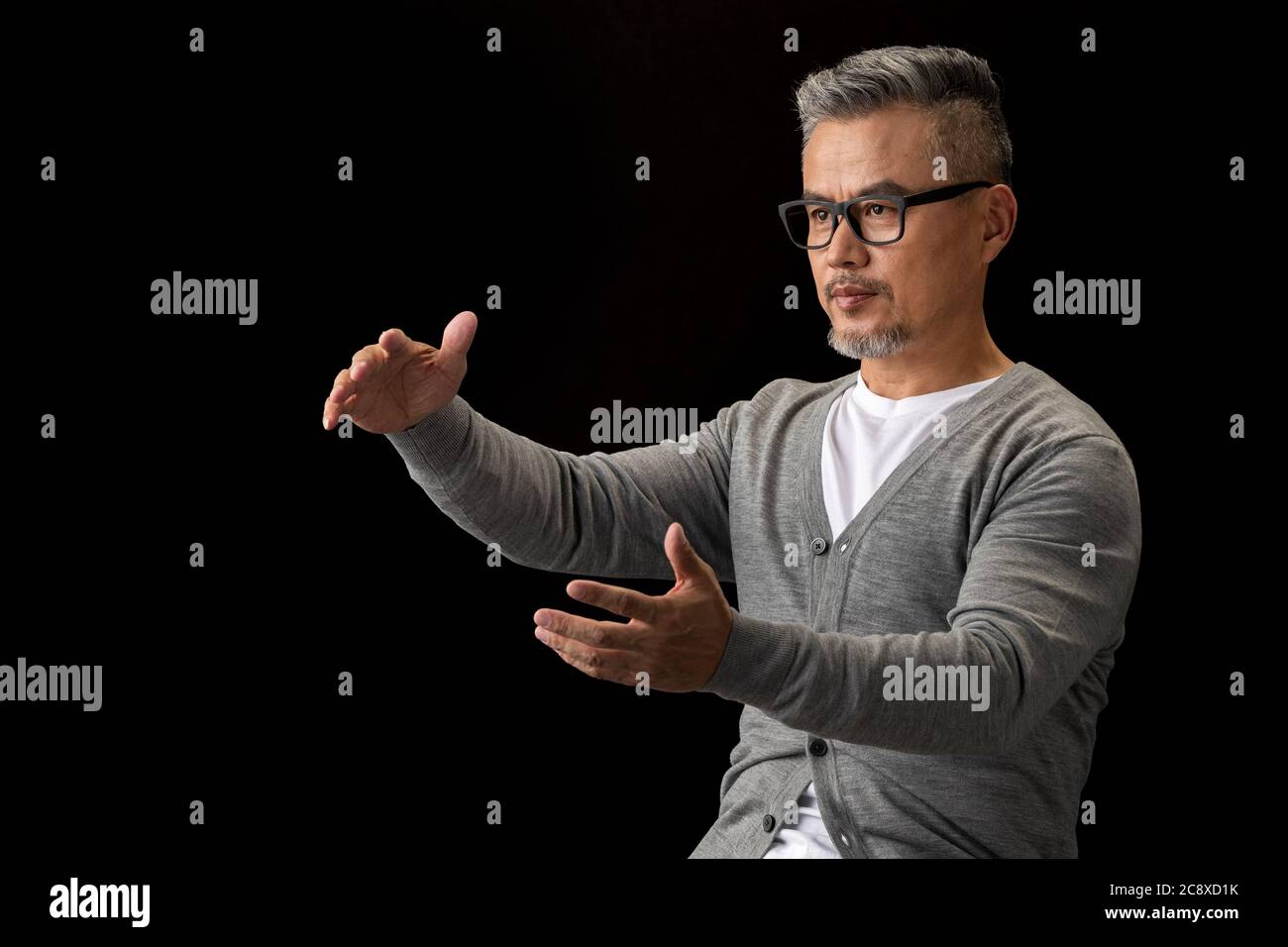 Well dressed man gestures hi-res stock photography and images - Alamy