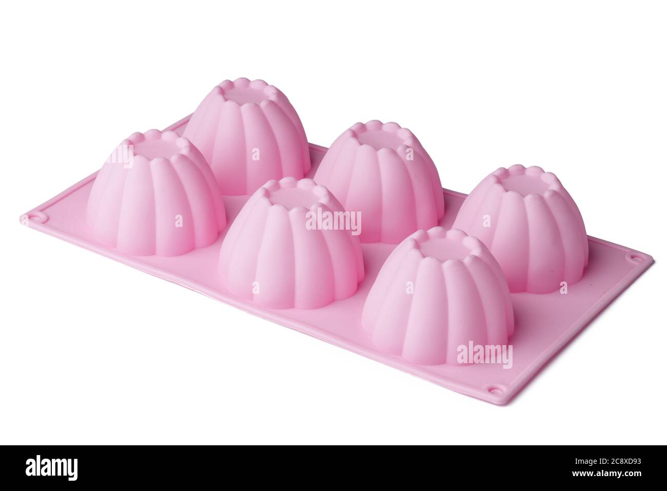 Silicone form for cupcake baking on white background Stock Photo - Alamy