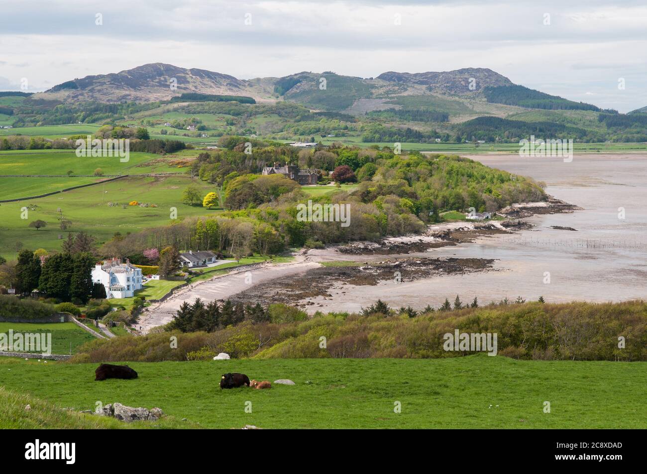 Balcary Bay Hotel with Screel and Bengairn behind Stock Photo - Alamy