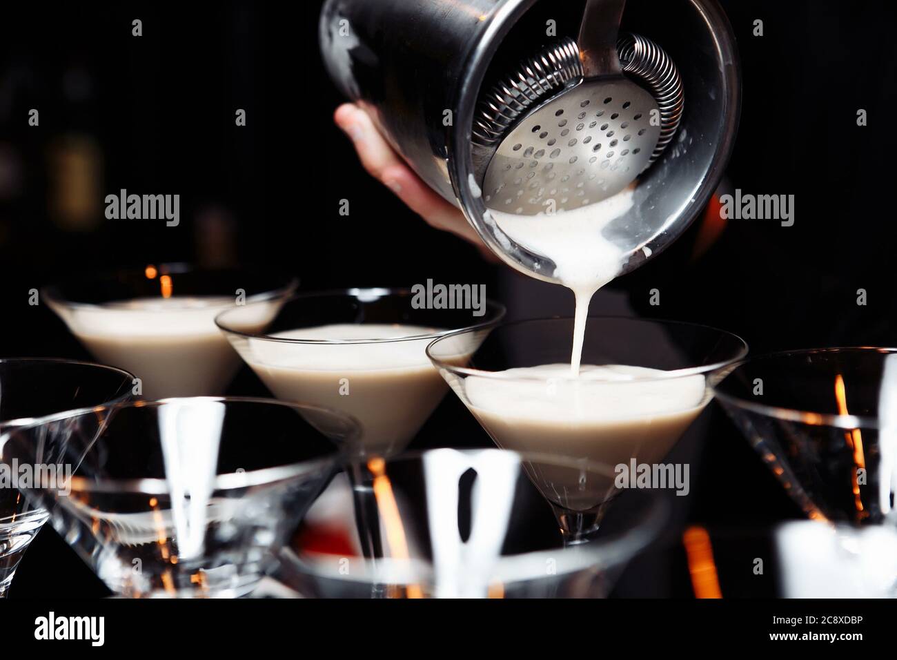 Hands holding cocktail shaker hi-res stock photography and images - Alamy