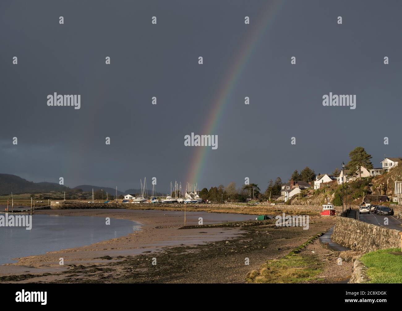Kippford Village near Dalbeattie with a colourful Rainbow Stock Photo ...
