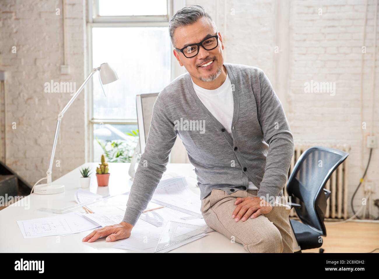 Asian Architect Desk Sitting High Resolution Stock Photography and ...