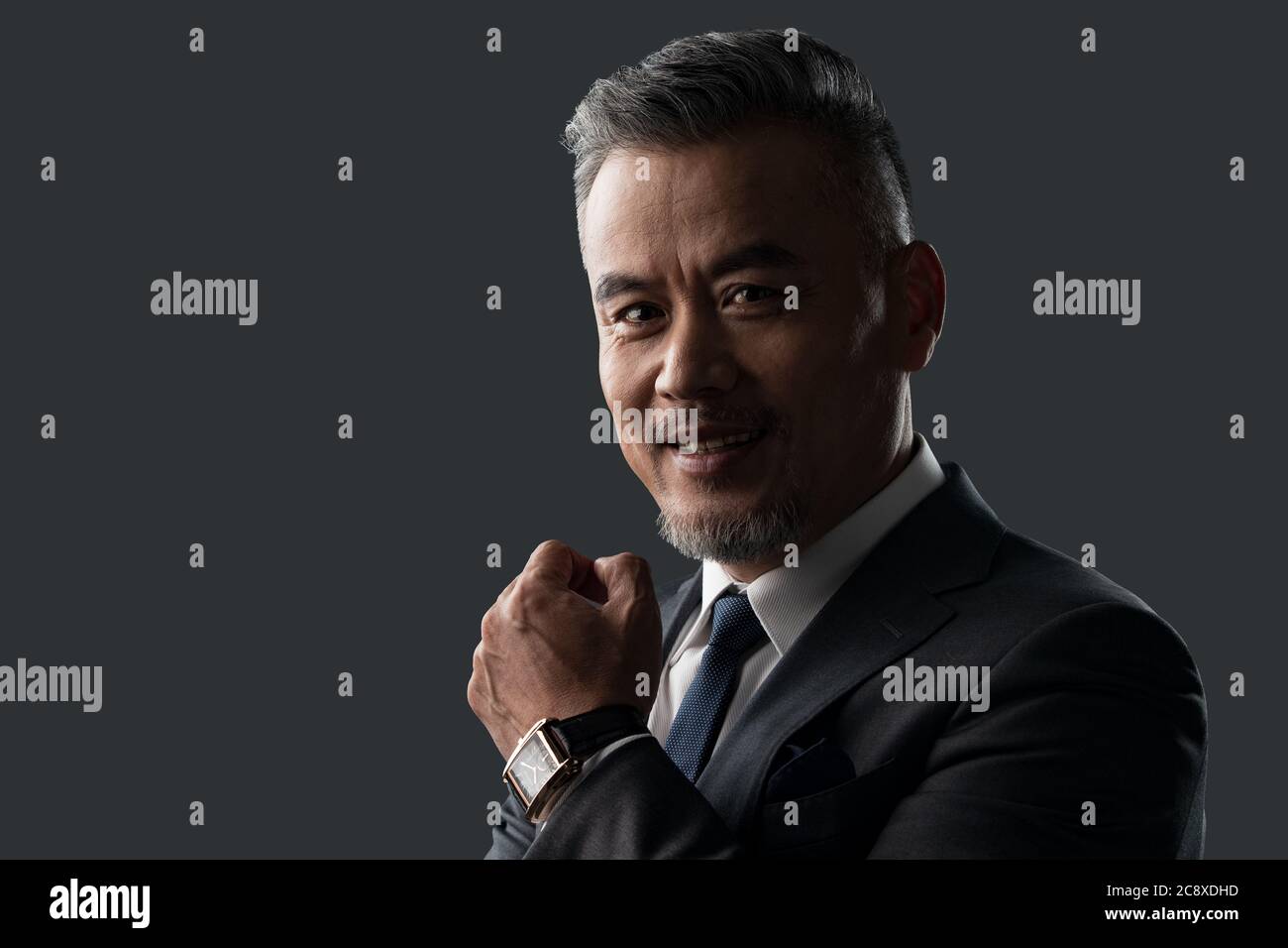 Happy mature business man Stock Photo - Alamy