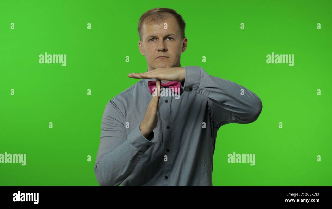 Man showing time out sign. This is limit, enough gesture. Begging to ...