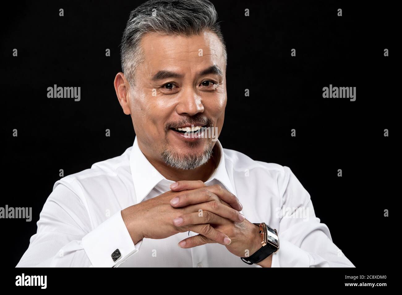 Successful business in middle-aged men Stock Photo - Alamy