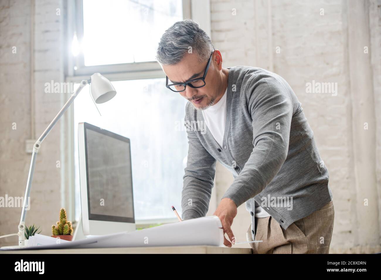 Interior painting drawings, a senior designer Stock Photo - Alamy