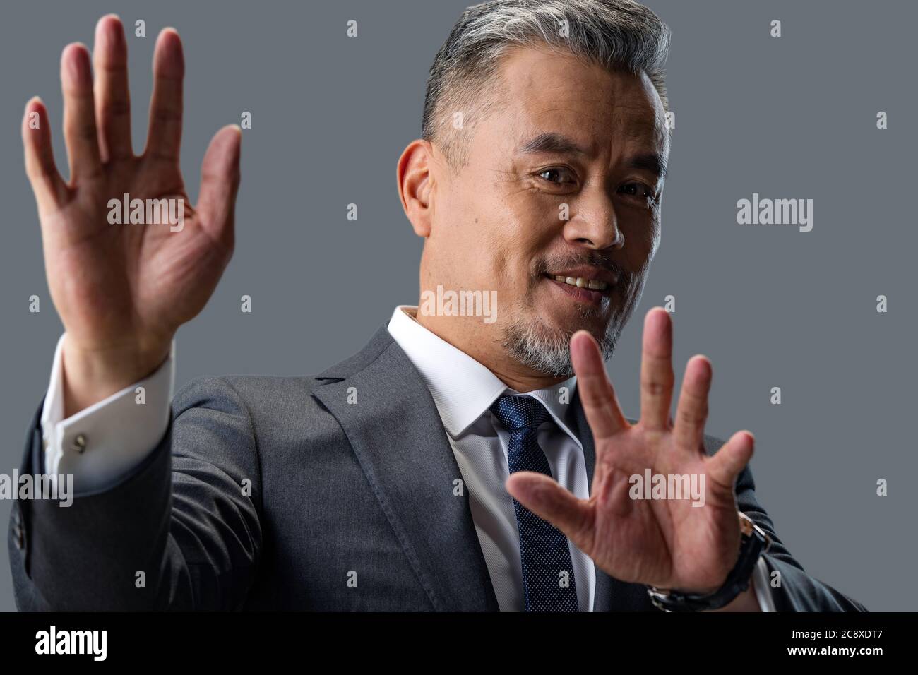 Business man stretched out his hand Stock Photo - Alamy