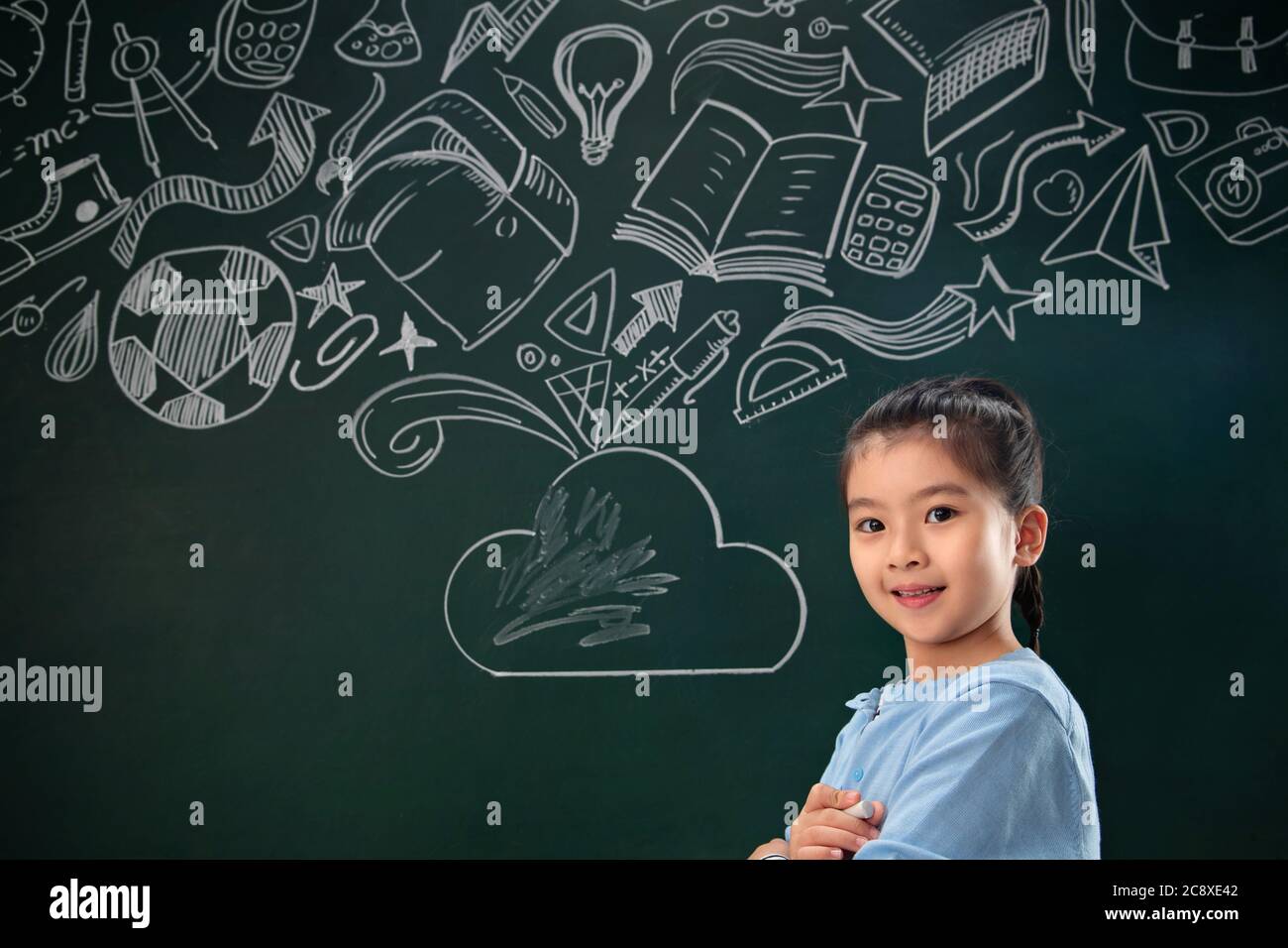 Standing in front of the blackboard primary school girls Stock Photo ...