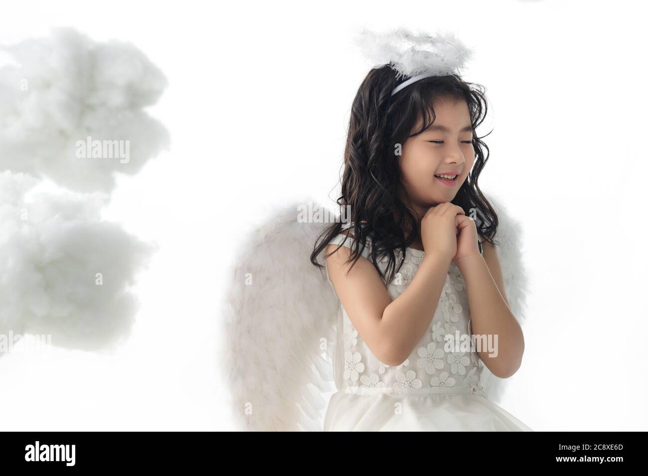 Praying angel cloud hi-res stock photography and images - Alamy