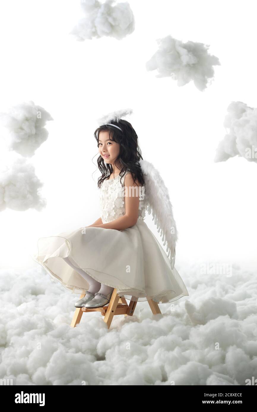 Sitting Cherub Angel High Resolution Stock Photography and Images - Alamy