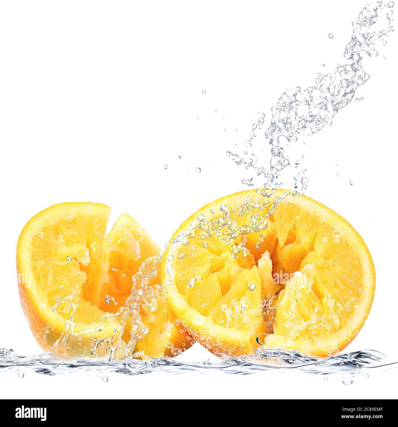 fresh orange falling in water Stock Photo - Alamy