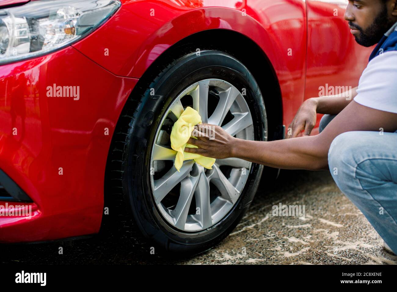 Car washing and detailing photo, car wash outdoors. Cropped image of ...