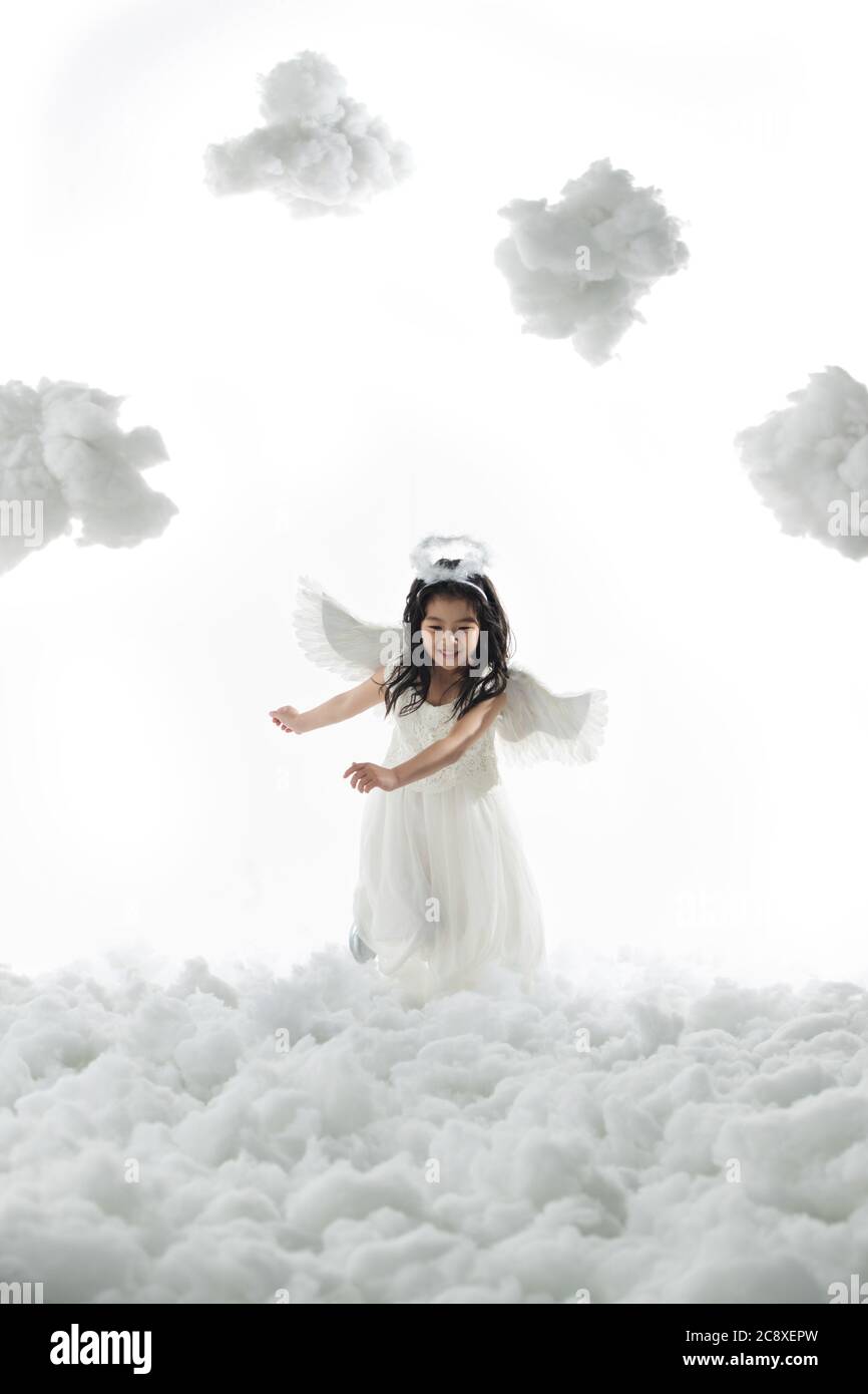 Angel running hi-res stock photography and images - Alamy