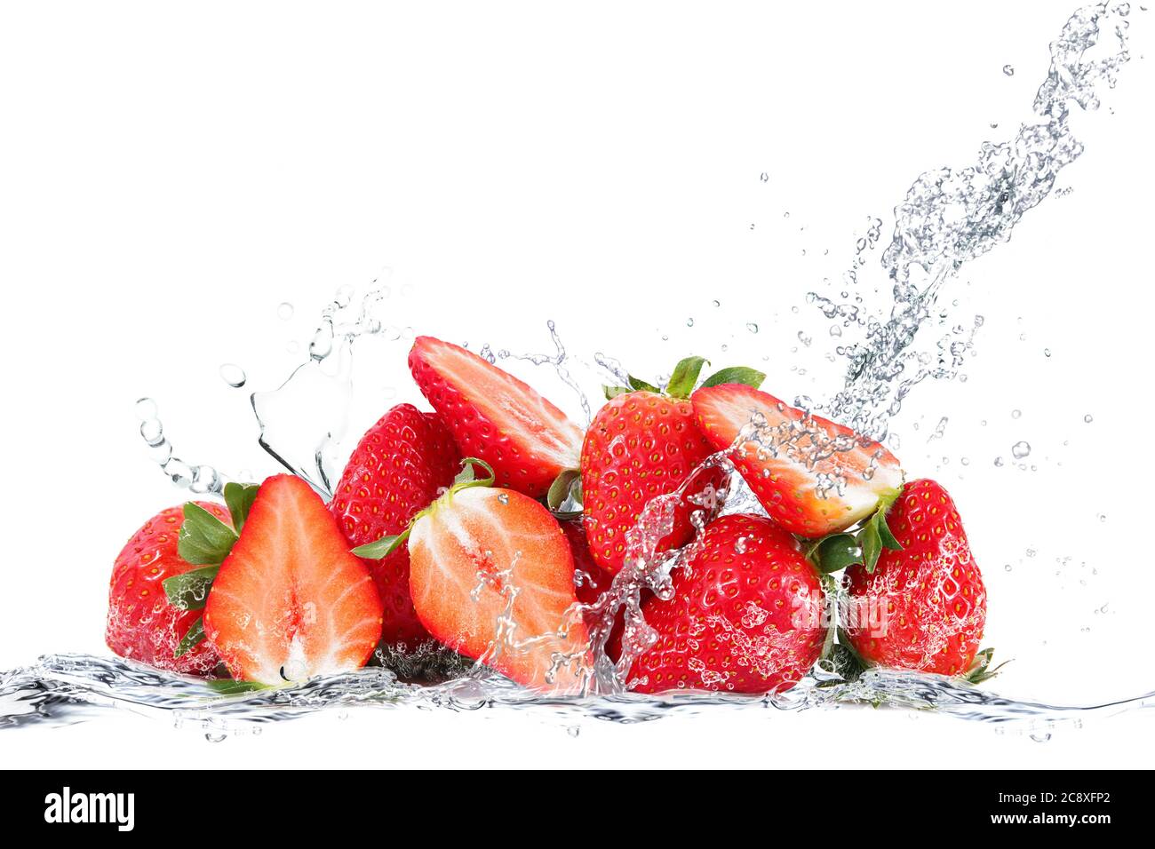 fresh strawberry falling in water Stock Photo - Alamy
