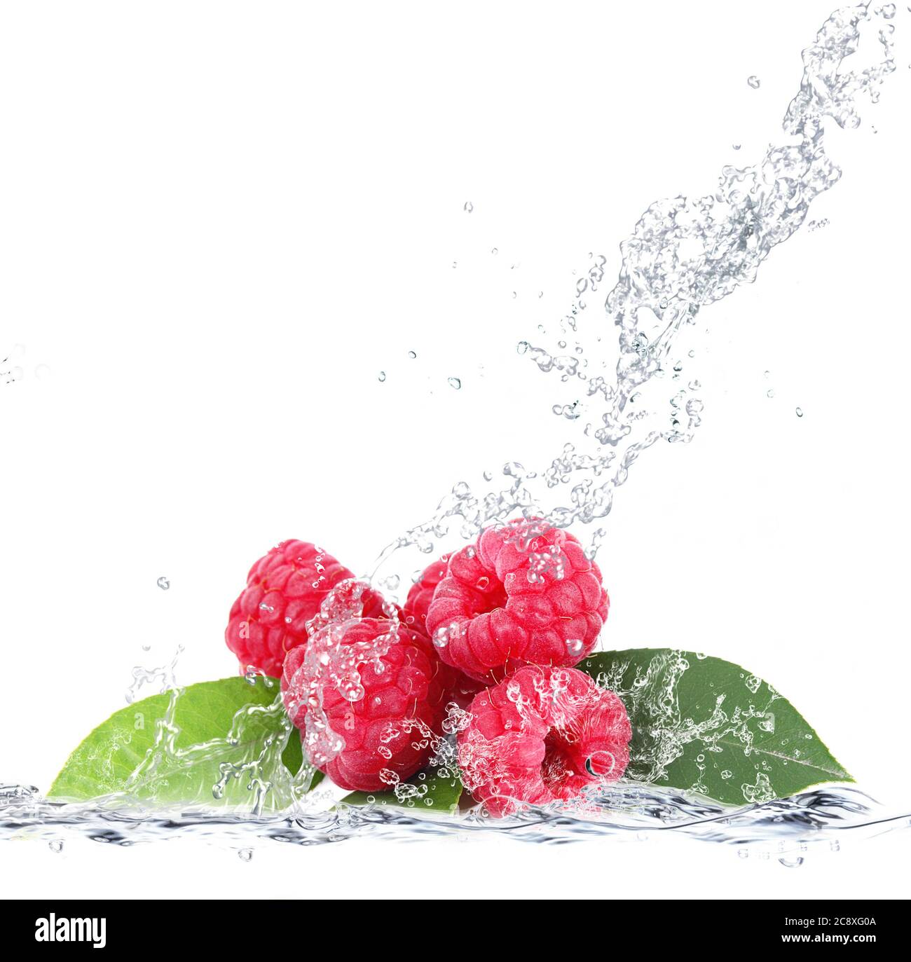 fresh raspberries falling in water Stock Photo - Alamy