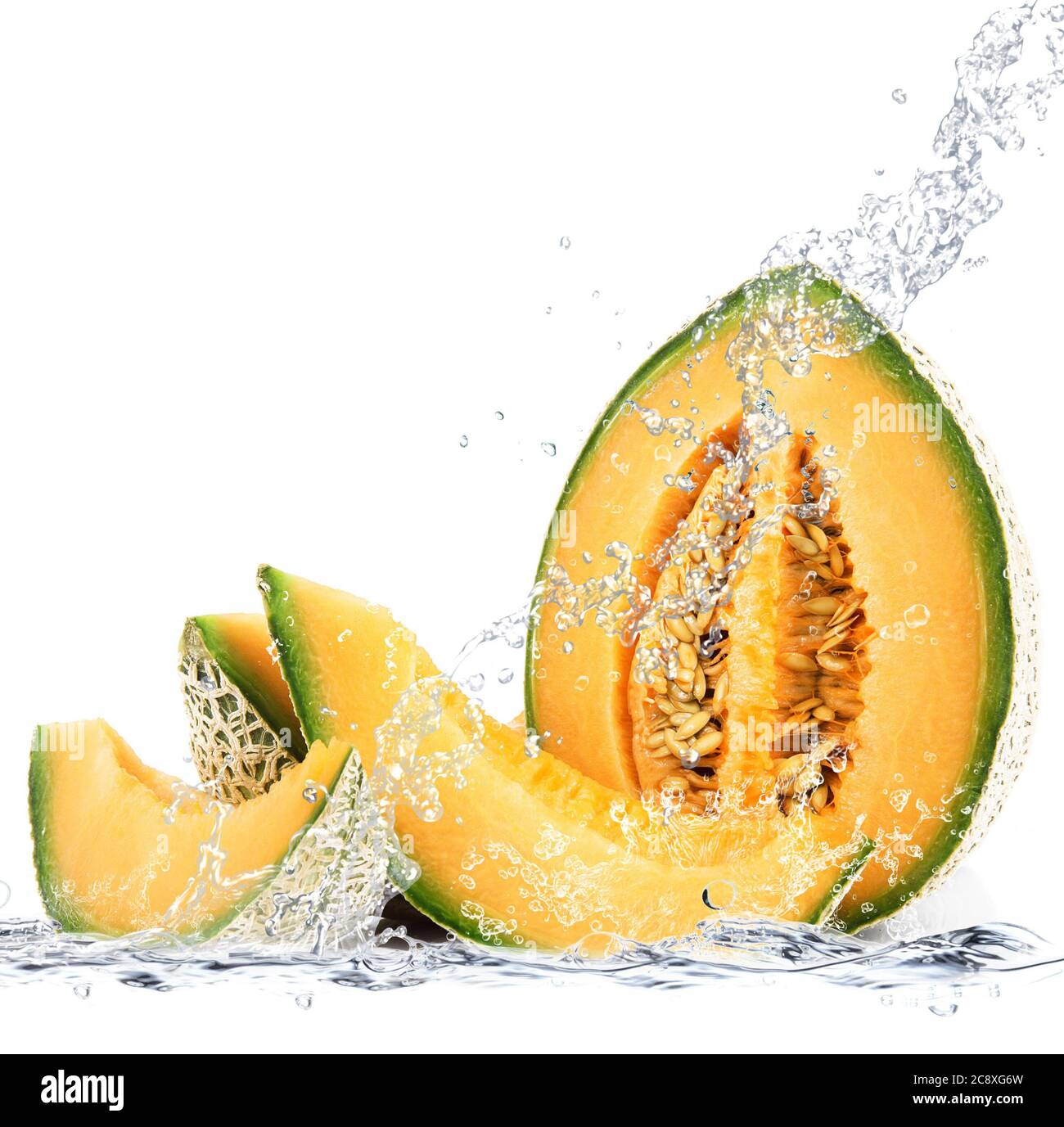 fresh melon falling in water Stock Photo - Alamy
