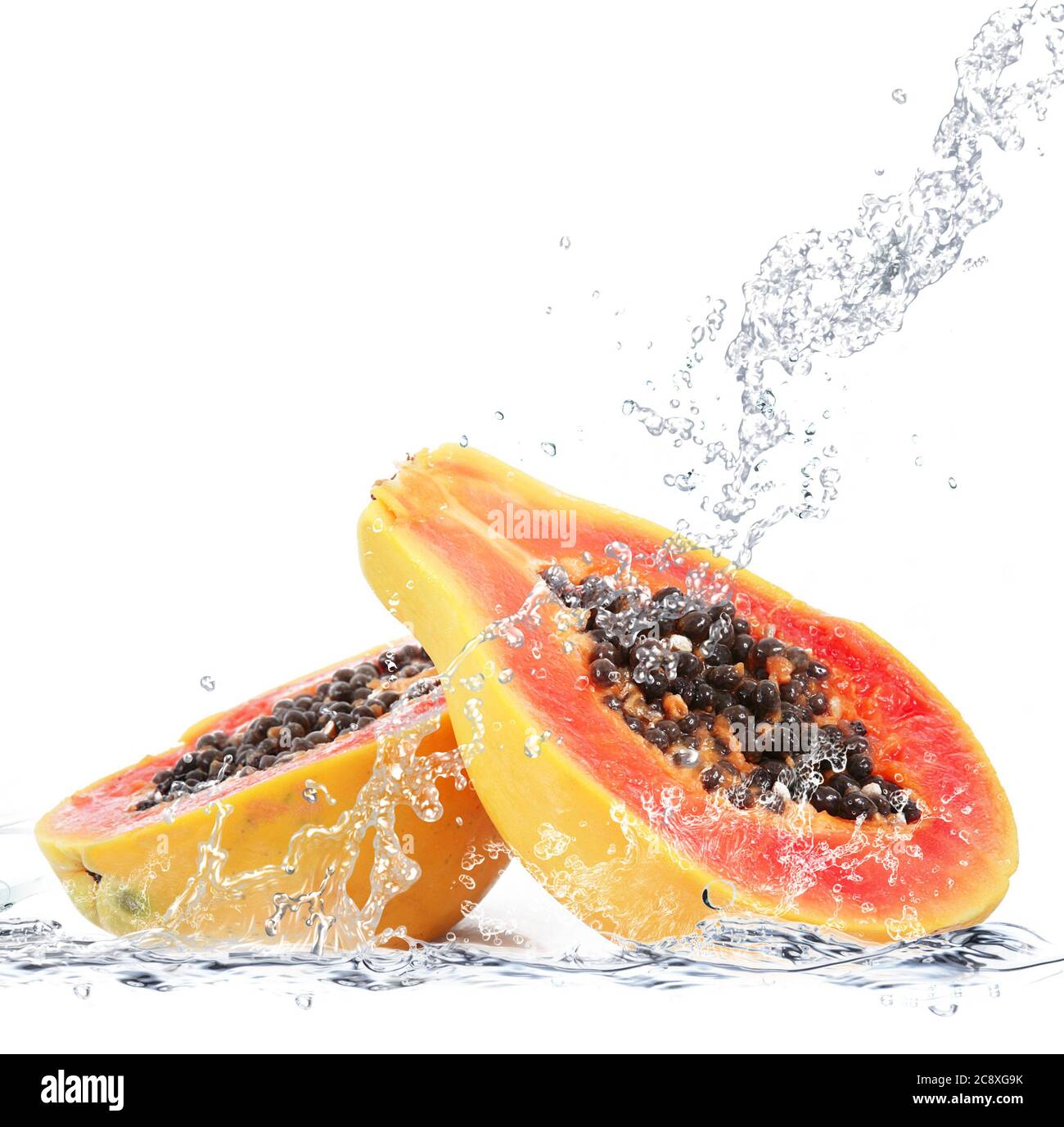 fresh papaya falling in water Stock Photo - Alamy