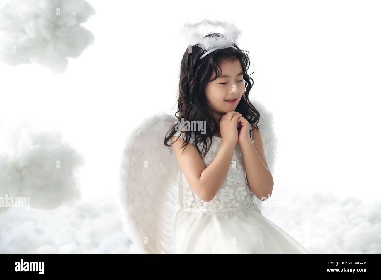 Praying angel cloud hi-res stock photography and images - Alamy