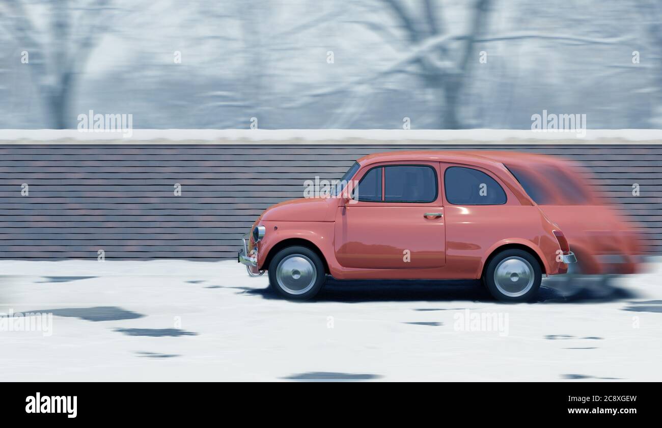 Little red car drives fast over the icy road, weather, safety seasonal ...