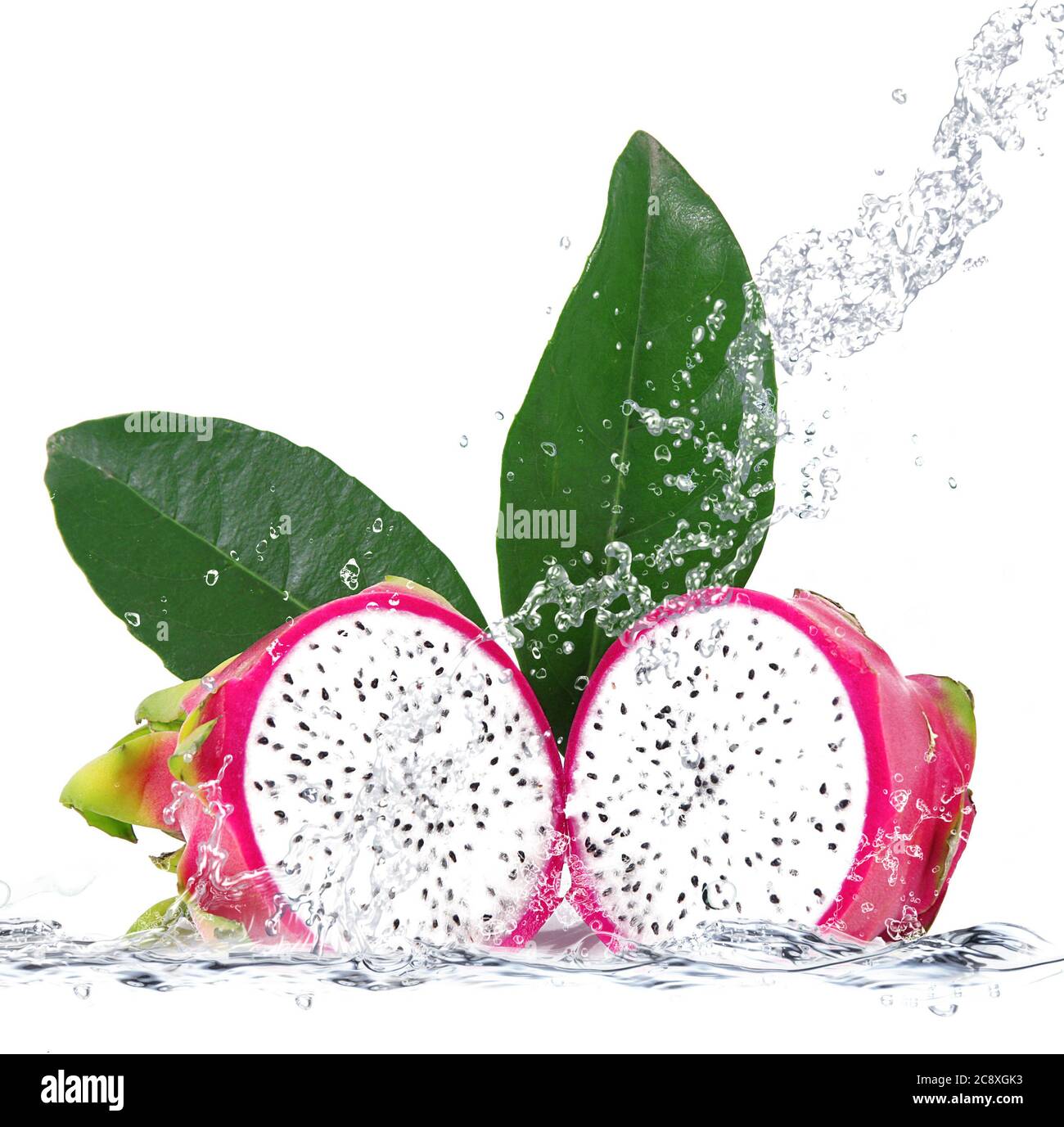 fresh pitaya falling in water Stock Photo - Alamy