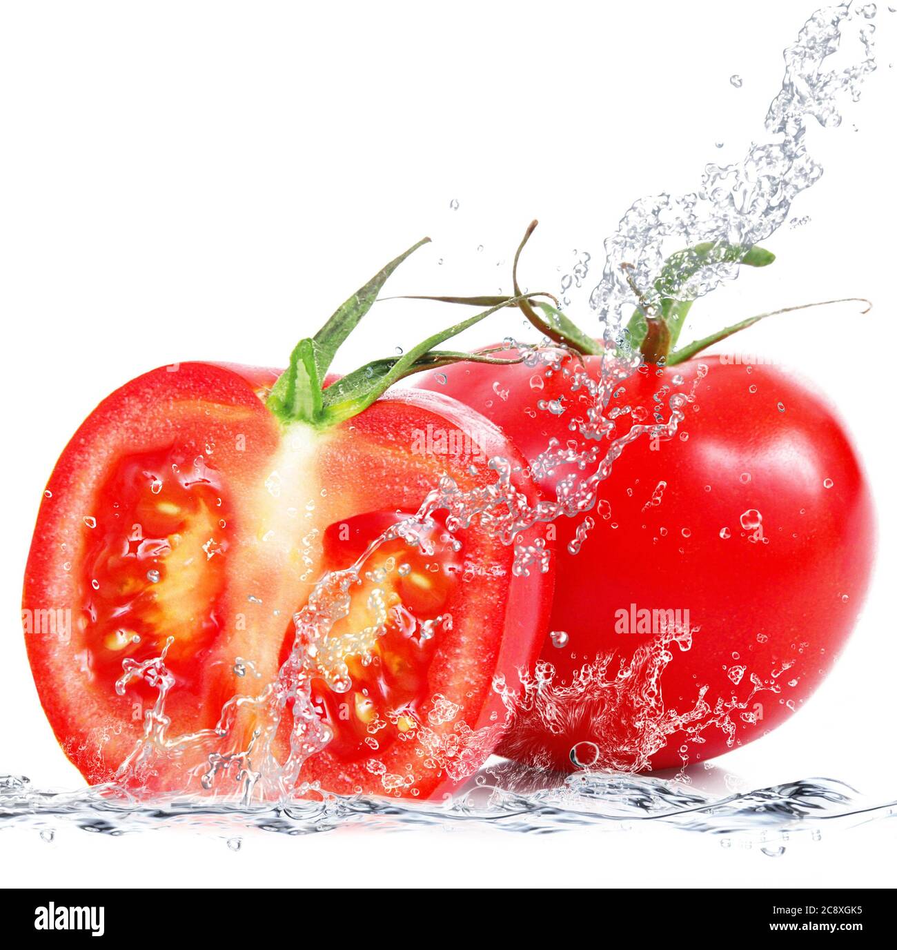fresh tomatoes falling in pure water Stock Photo - Alamy