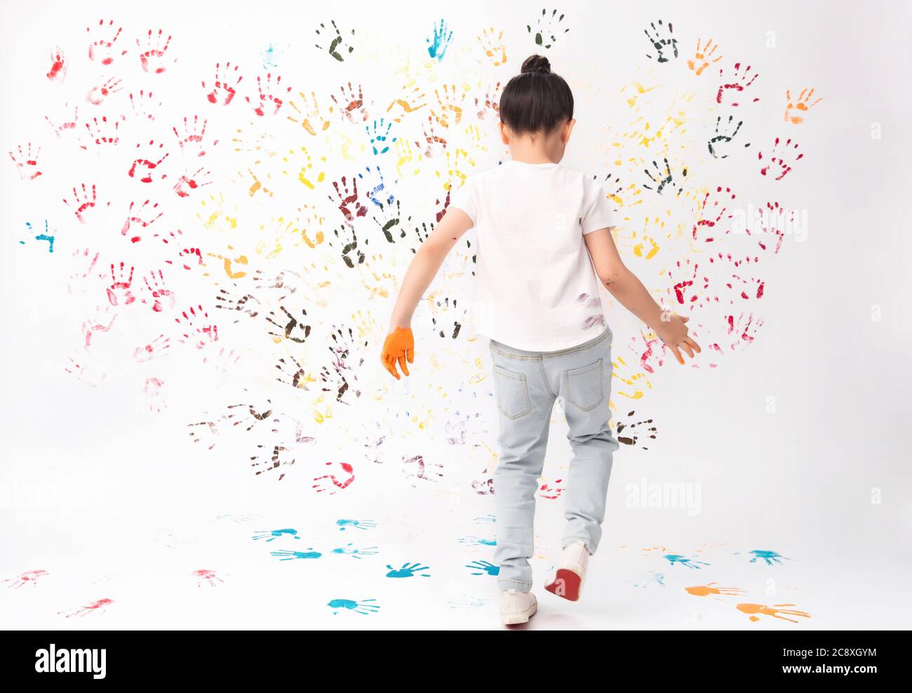 The little girl hand painted paints Stock Photo - Alamy
