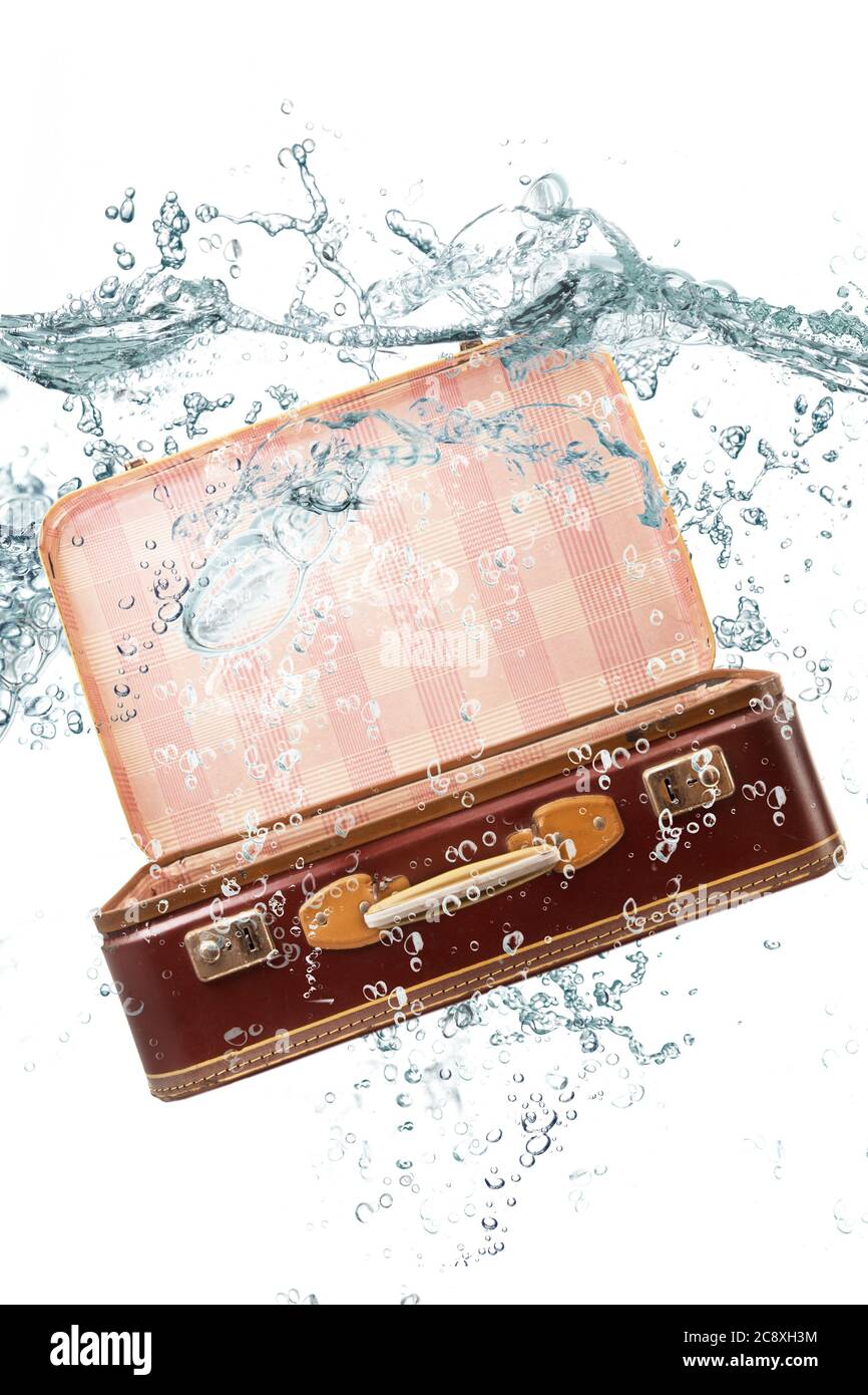 fresh in suitcase falling in water Stock Photo - Alamy