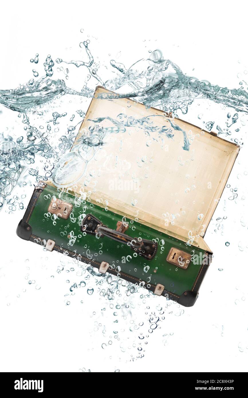 fresh in suitcase falling in water Stock Photo - Alamy