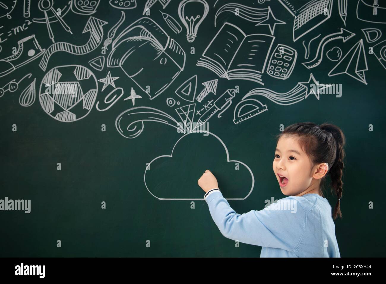 Standing in front of the blackboard primary school girls Stock Photo ...