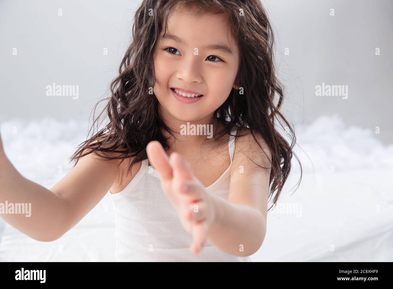Playing cute girl Stock Photo - Alamy