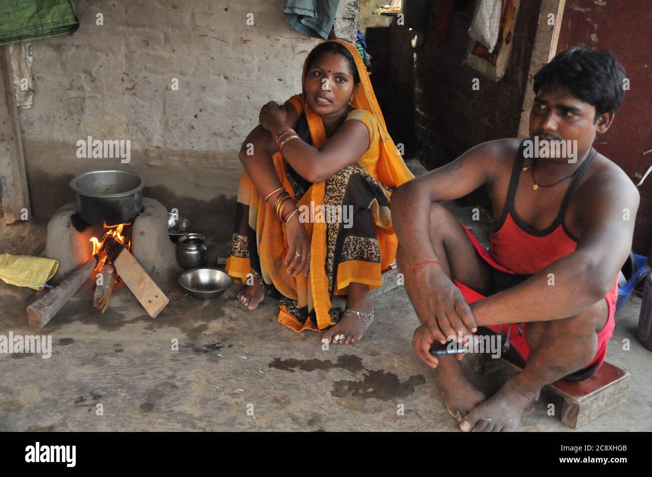 Gurugram, India. 26th July, 2020. Manoj Raikwar and his wife Mamta are seen at home in Gurugram ...
