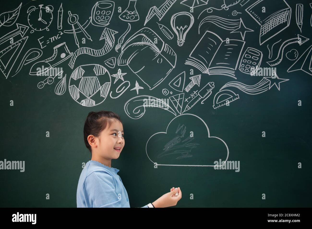 Standing in front of the blackboard primary school girls Stock Photo ...