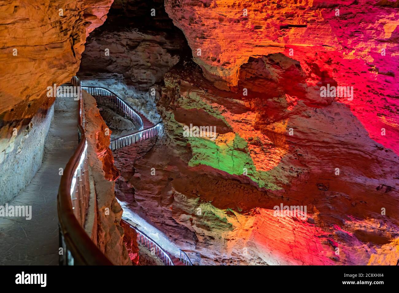 Illuminated stairs and walking trail path inside the stunning and ...