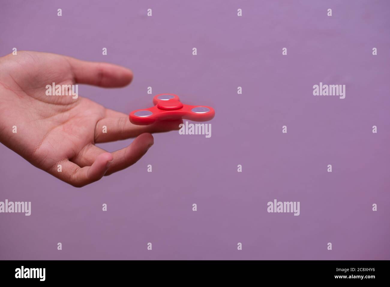 Hand spinning toy hi-res stock photography and images - Alamy