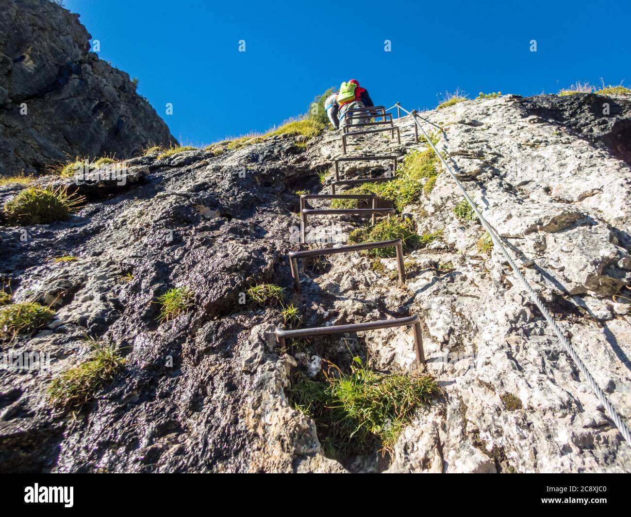 Climbing on the Pisciadu via ferrata of the Sella group in the ...