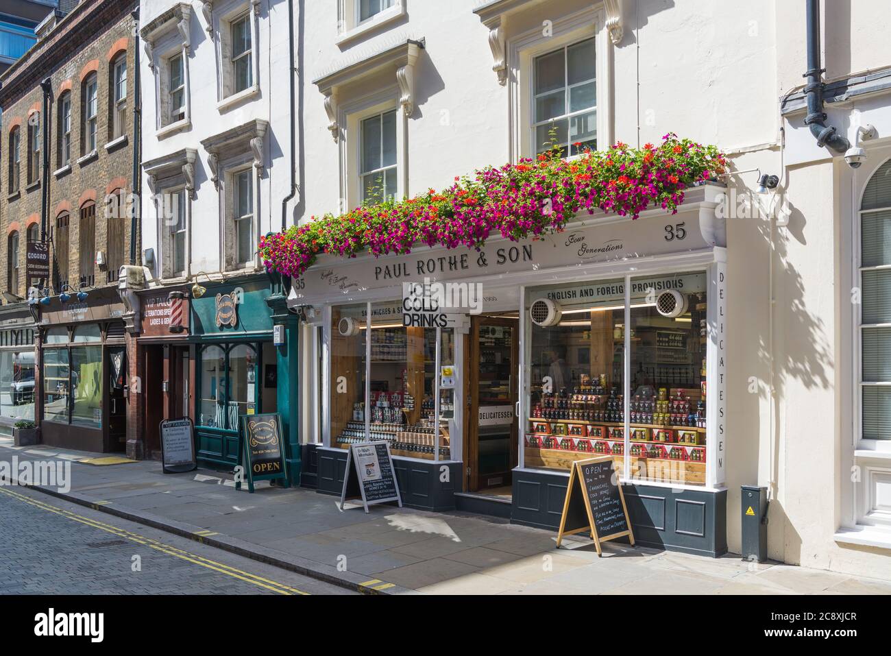 Paul Rothe & Son delicatessen standing prominently in a row of small ...