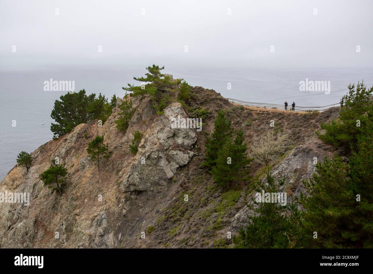 Men and women walk to Muir Beach Overlook in Marin County, CA, which ...