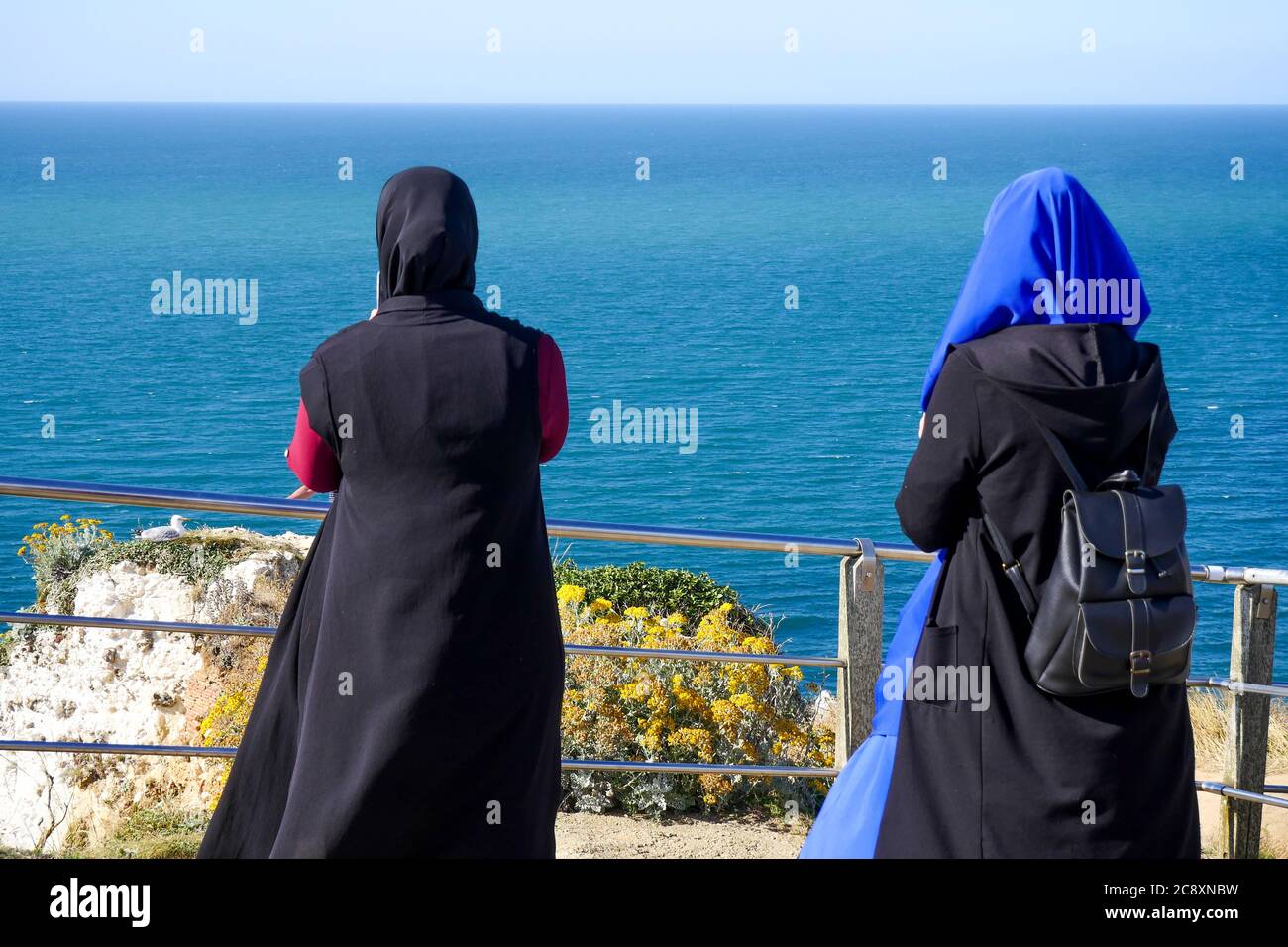 Muslim tourists, Etretat, Seine-Maritime, Normandy, France Stock Photo ...