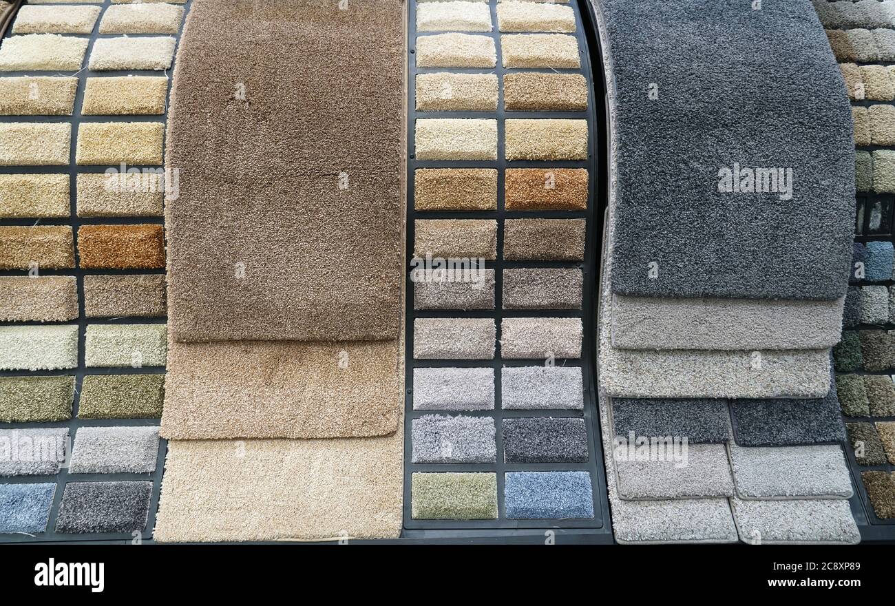 Colorful carpet samples in the store Stock Photo - Alamy