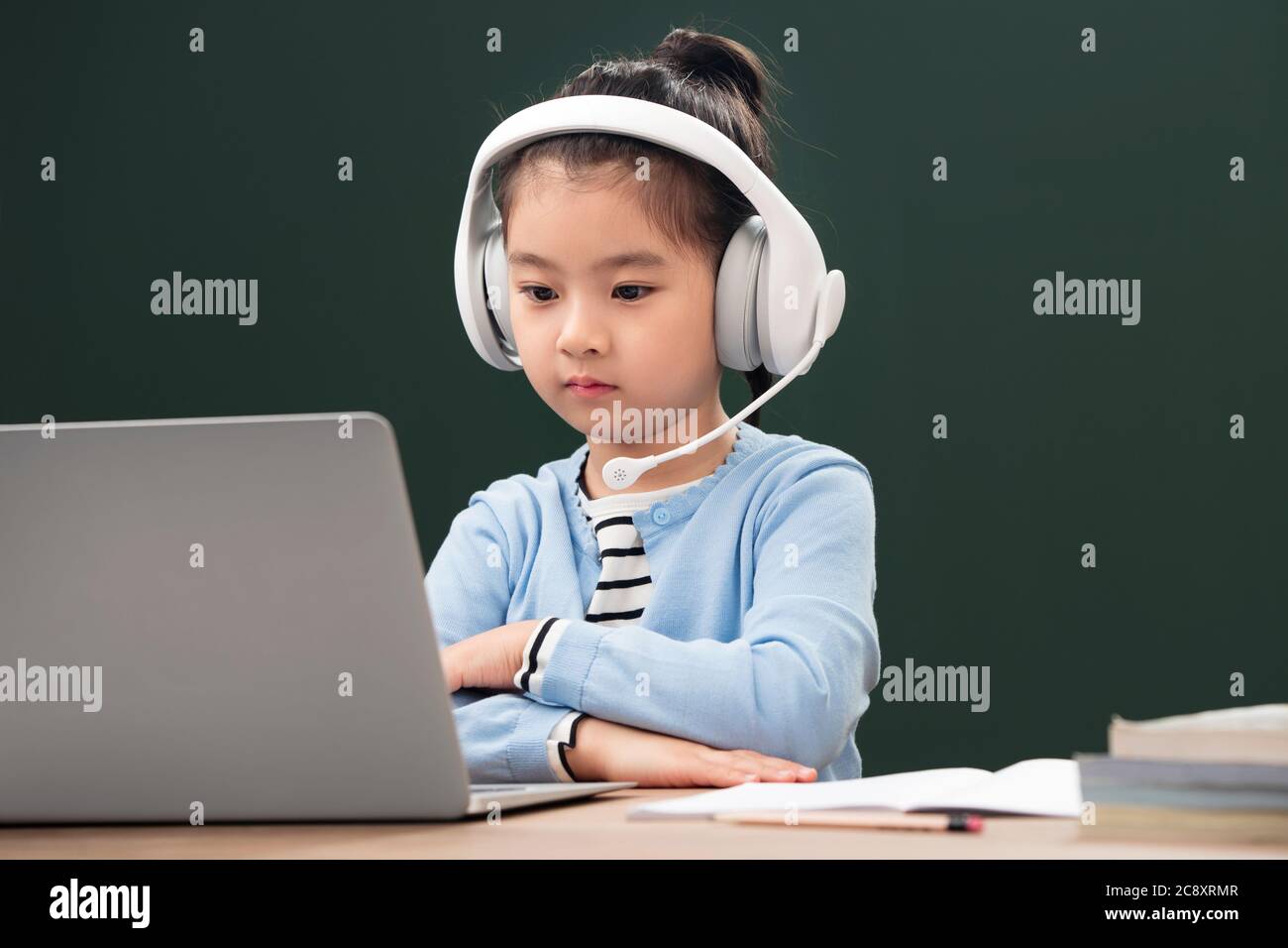 Primary school girls online learning Stock Photo - Alamy