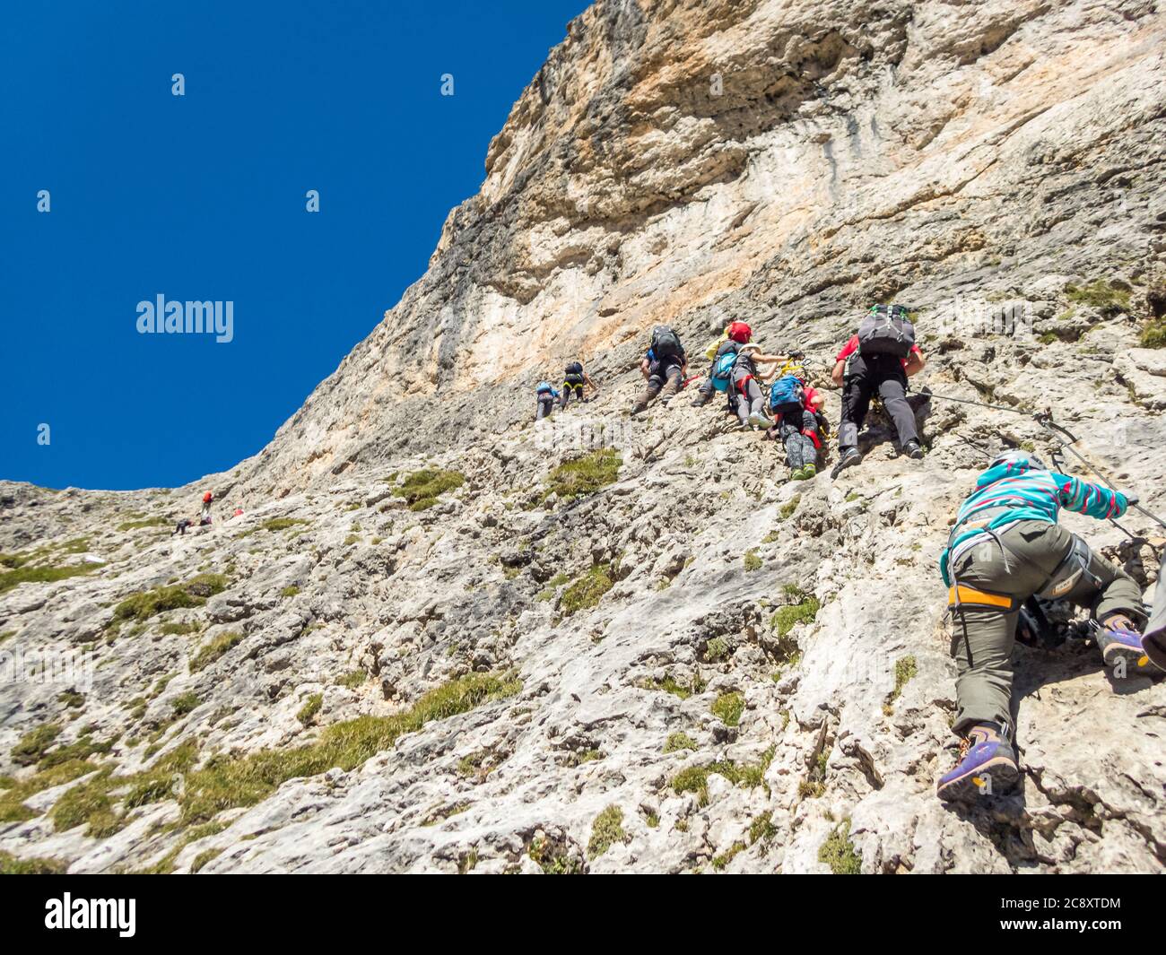 Climbing on the Pisciadu via ferrata of the Sella group in the ...