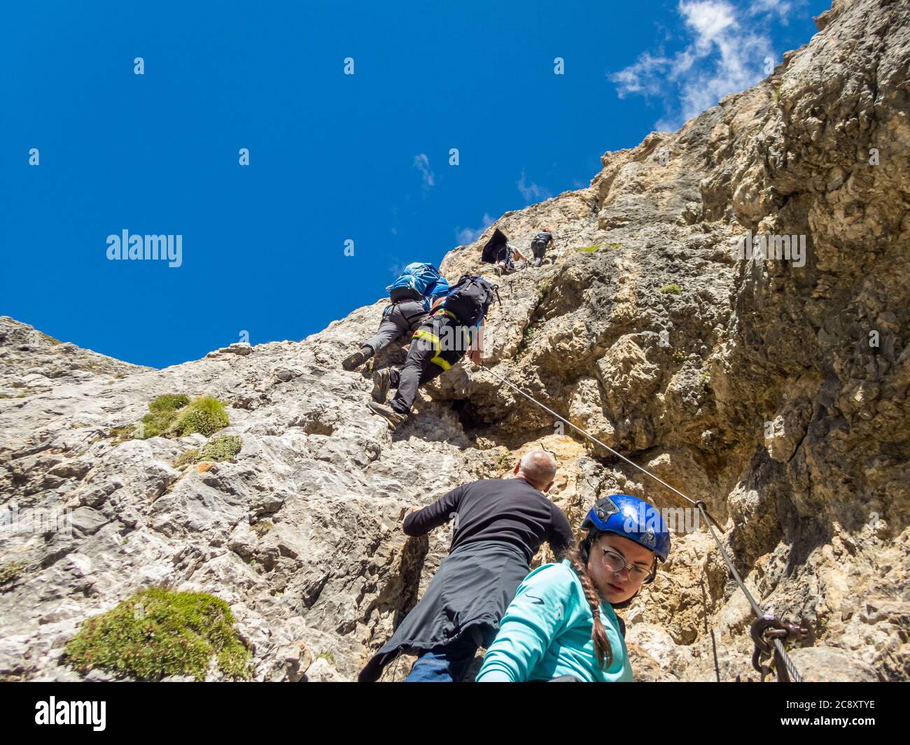 Climbing on the Pisciadu via ferrata of the Sella group in the ...