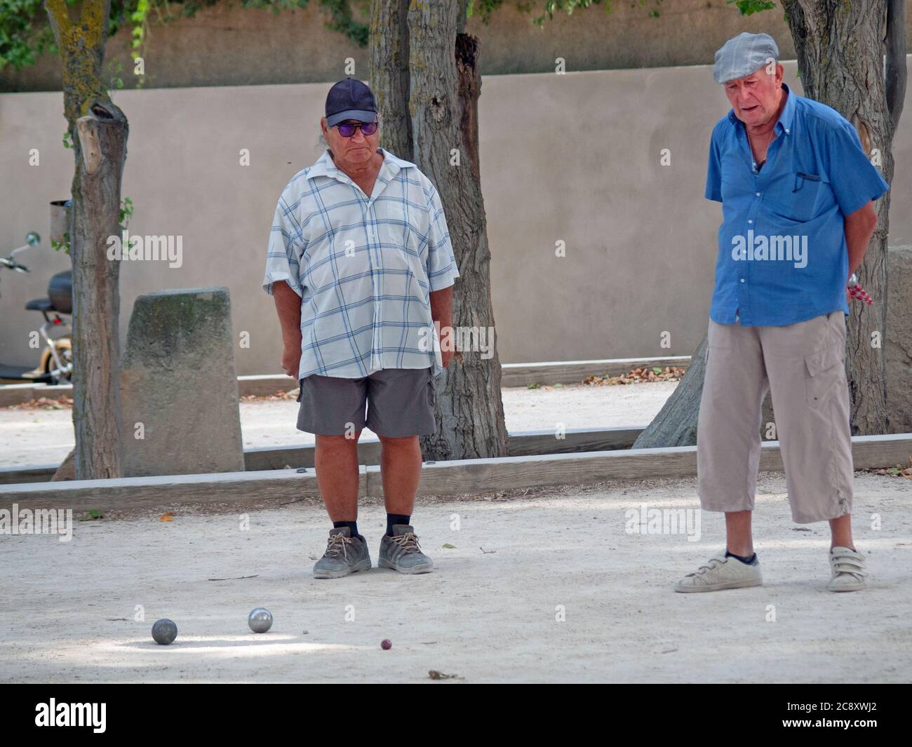 A game of boules in the French village of Serignan Stock Photo - Alamy
