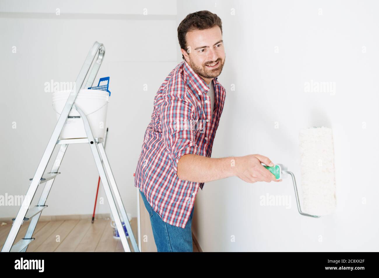 Man painting house caucasian hi-res stock photography and images - Alamy