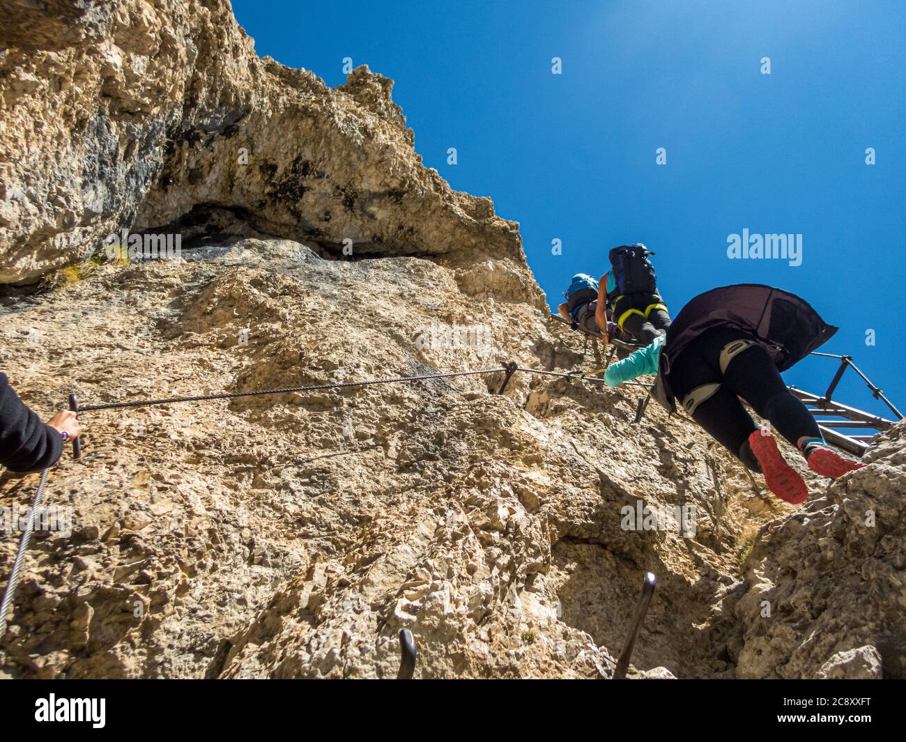 Climbing on the Pisciadu via ferrata of the Sella group in the ...