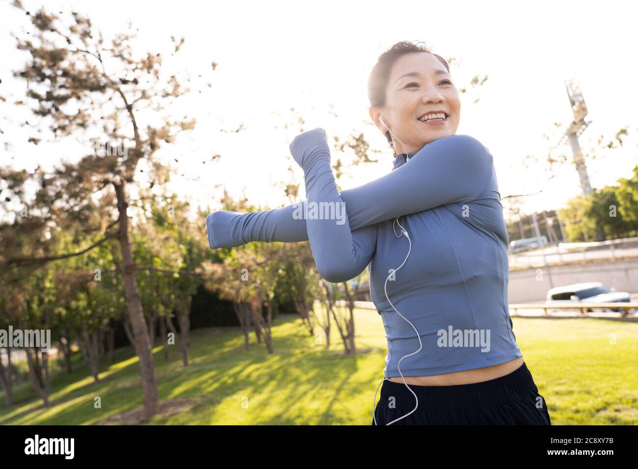 The middle-aged woman in outdoor fitness Stock Photo - Alamy