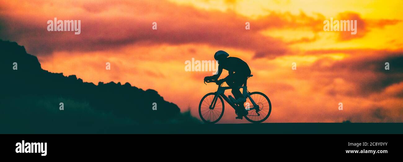 Road bike triathlon race cyclist on racing bike biking competition at ...