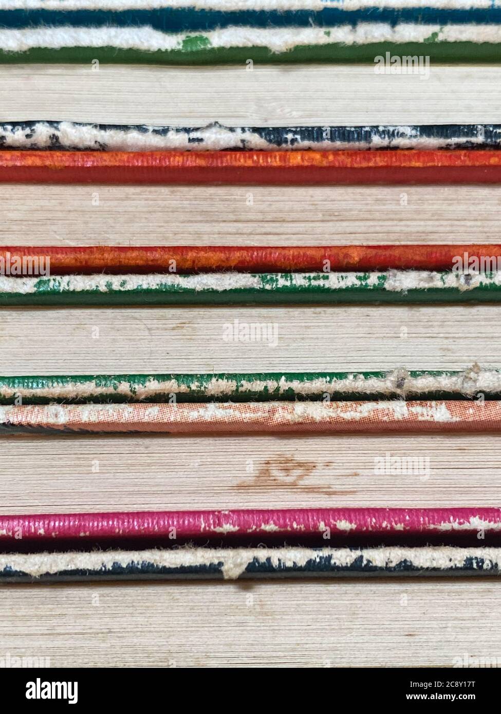 An abstract view of a stack of old and worn childrens books Stock Photo ...