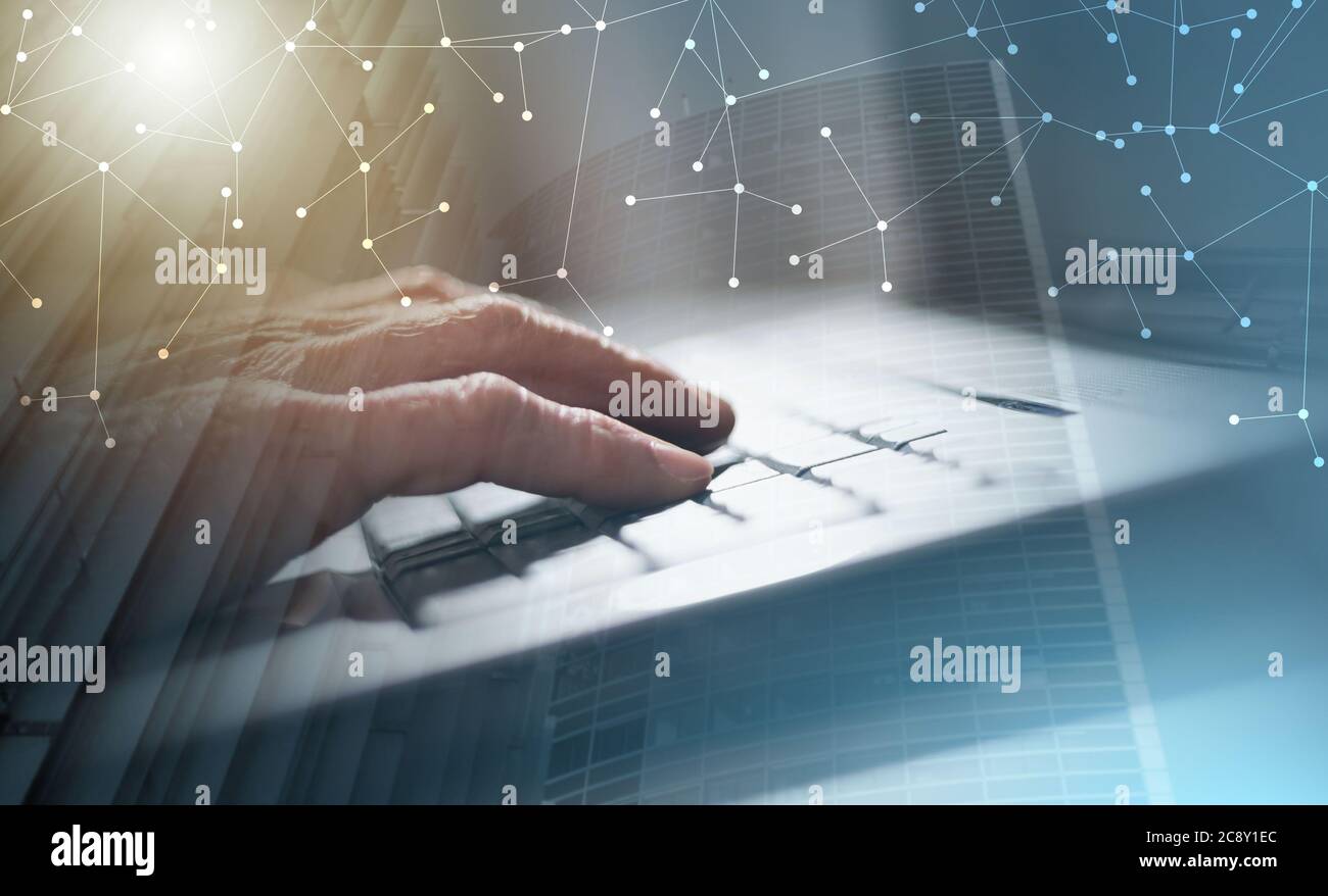 Hands typing on a laptop; multiple exposure Stock Photo - Alamy