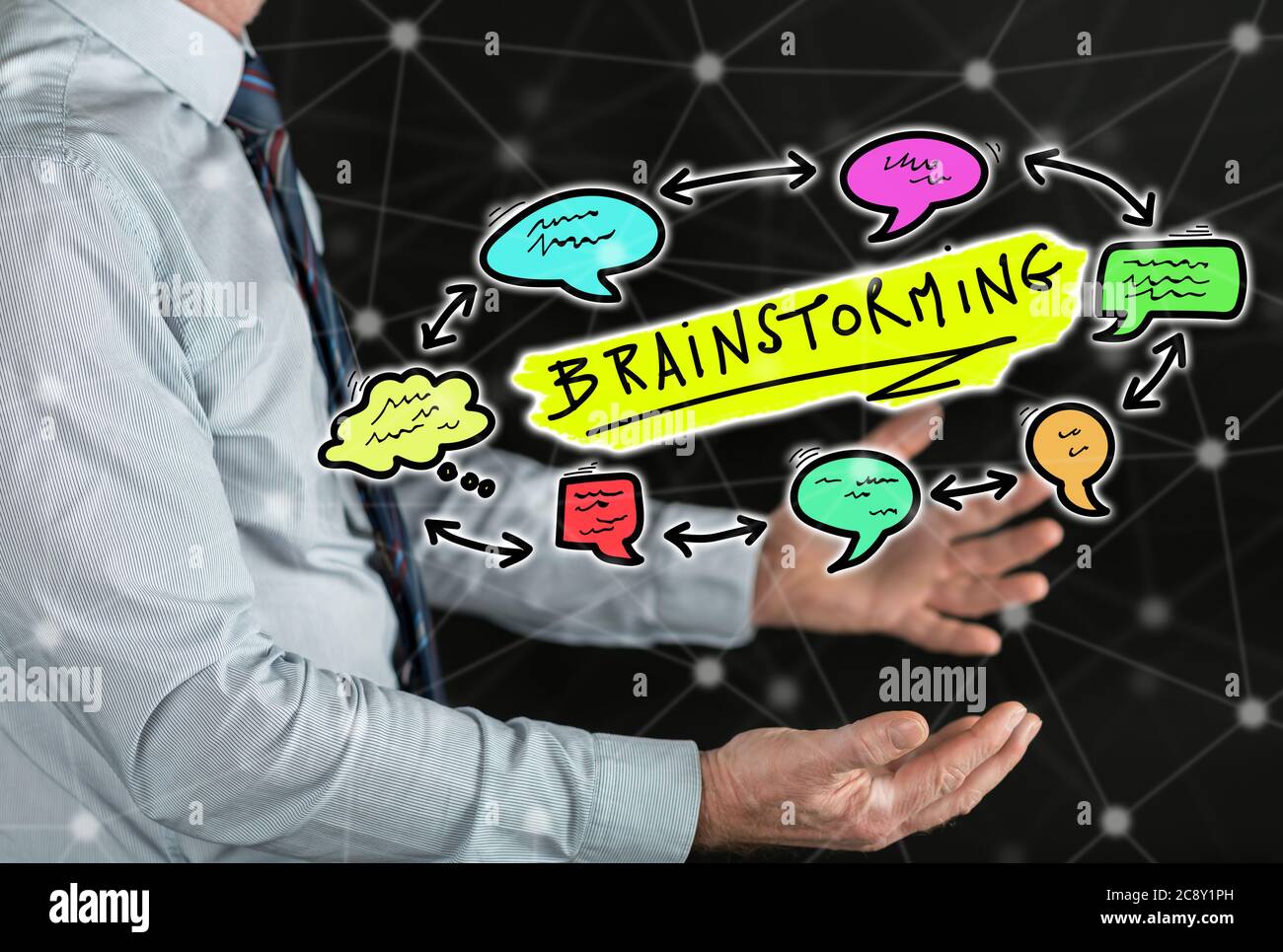 Brainstorming concept above the hands of a man Stock Photo - Alamy